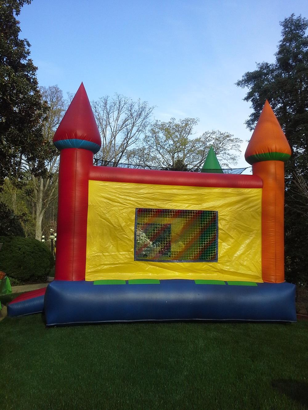 Large Multi Colored Castle - Jumpy Fun Bounce House Rentals